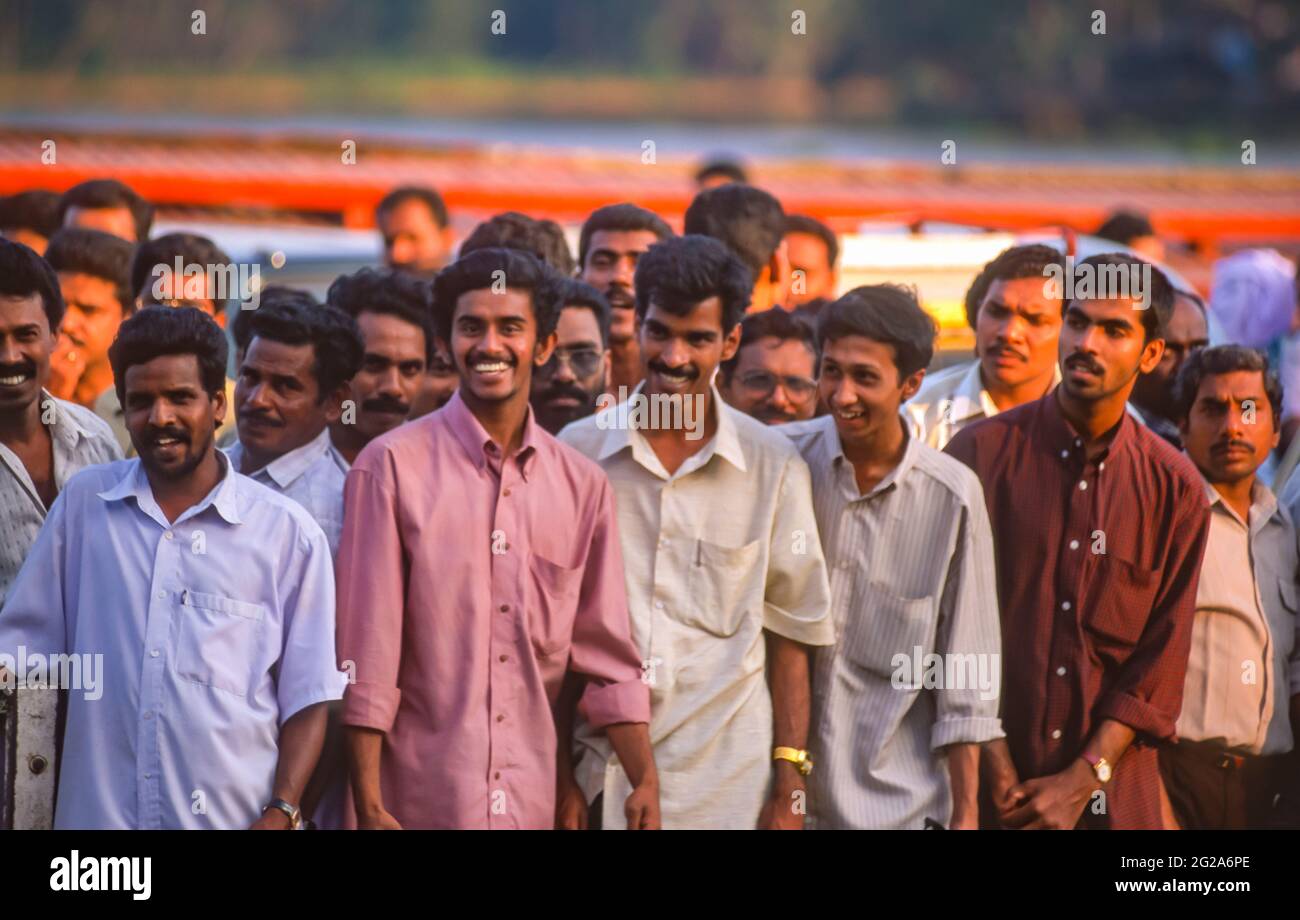 KERALA, INDIA - Crowd of men on river ferry Stock Photo - Alamy