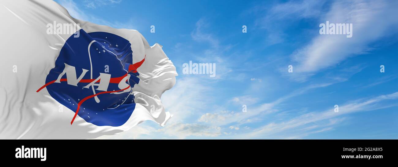 flag of NASA, National Aeronautics and Space Administration waving in ...