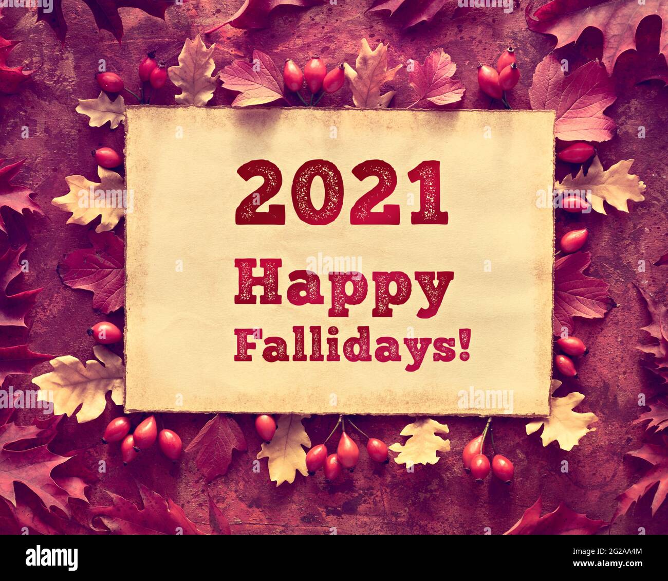 Text 2021 Happy Fallidays on aged paper, parchment. Autumn leaves, flat ...
