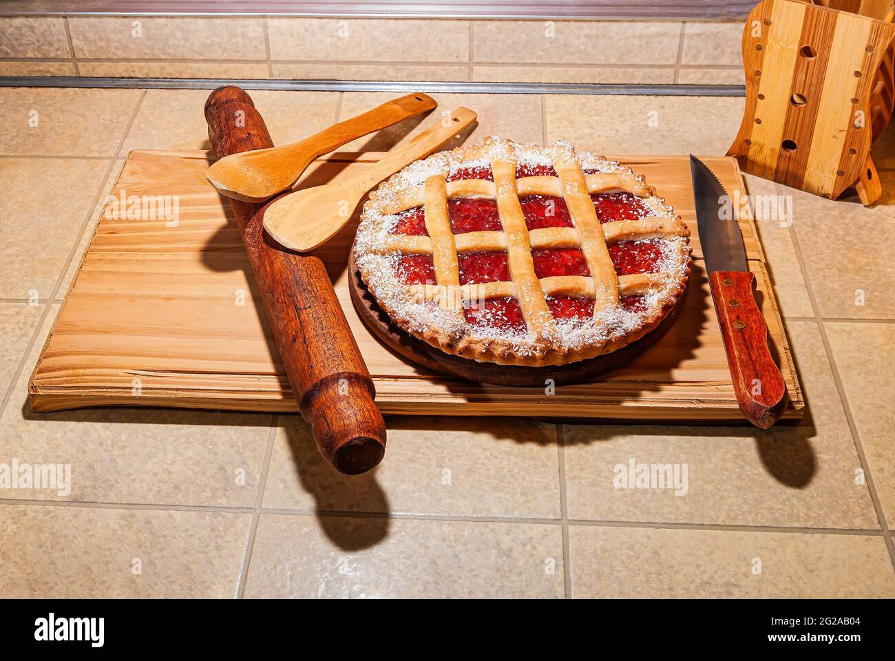 Close-up of a warm homemade Pasta Frola tart filled with quince and ...