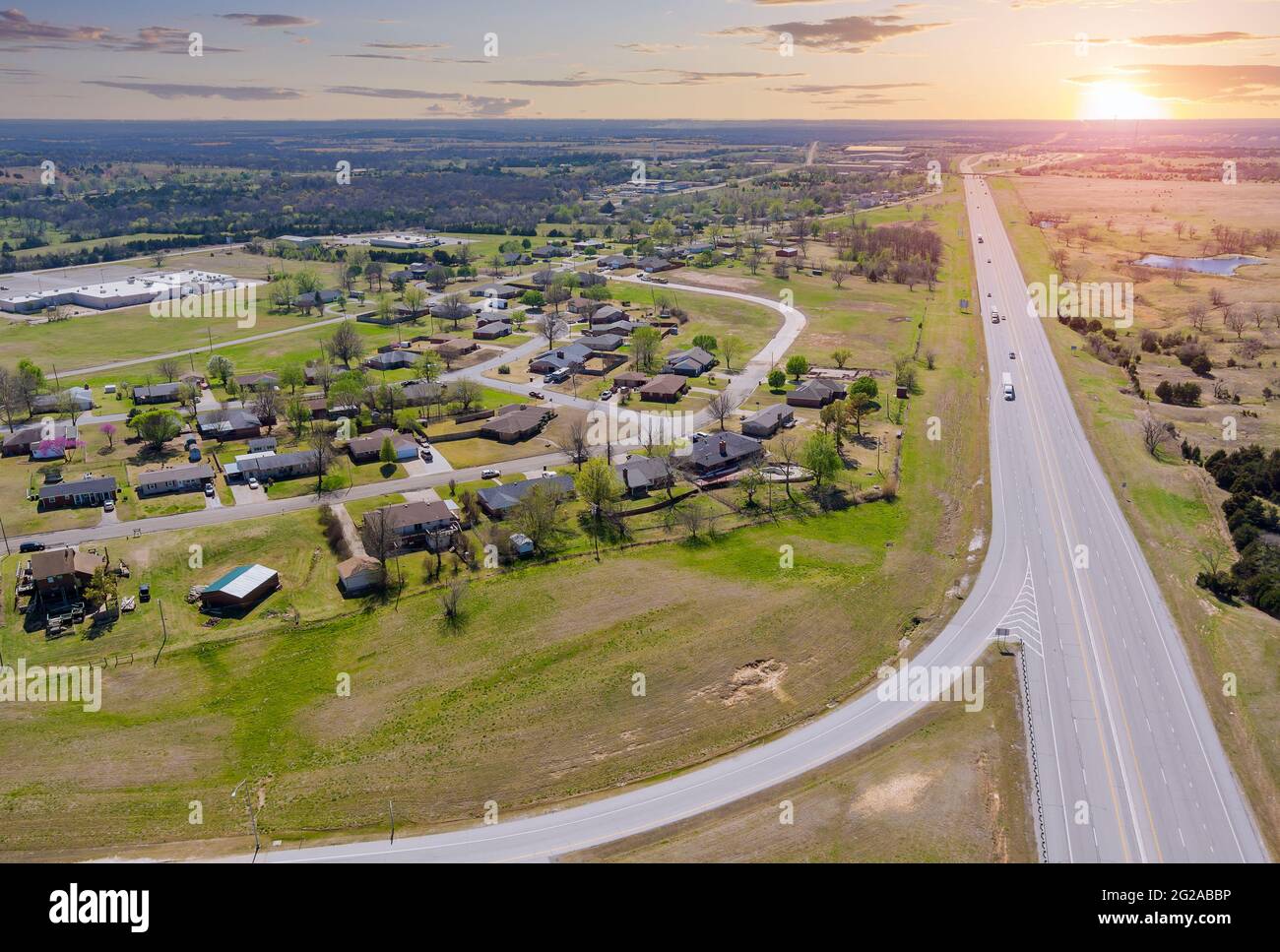 Panorama aerial view of small town near road highway located in central ...