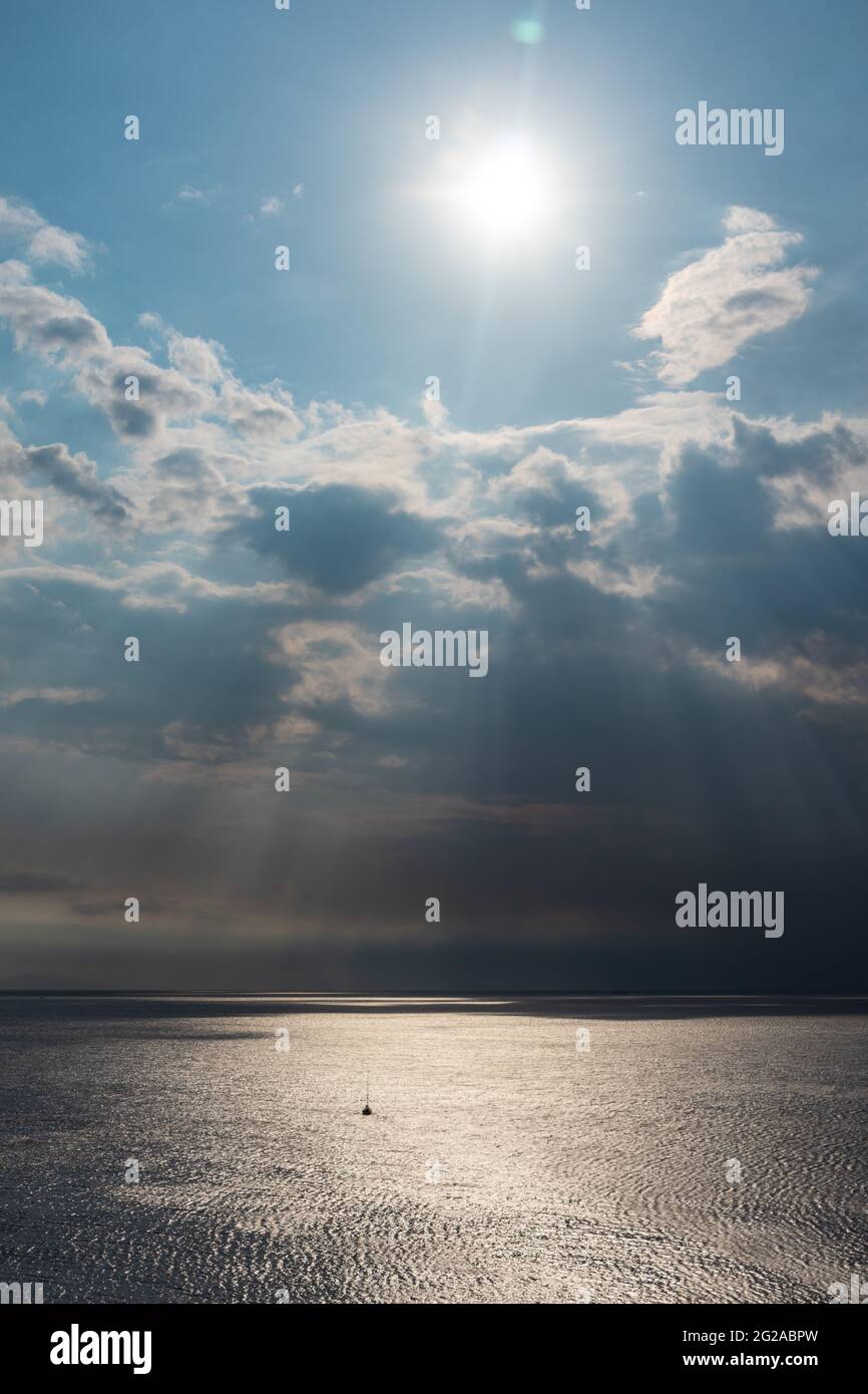 Vertical dramatic cloudscape sun rays hi-res stock photography and ...