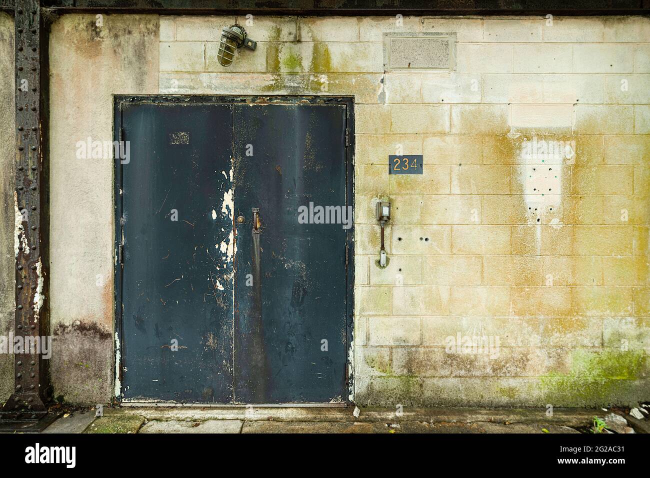 Old battered rusty doors on an abandoned military building in Virginia ...