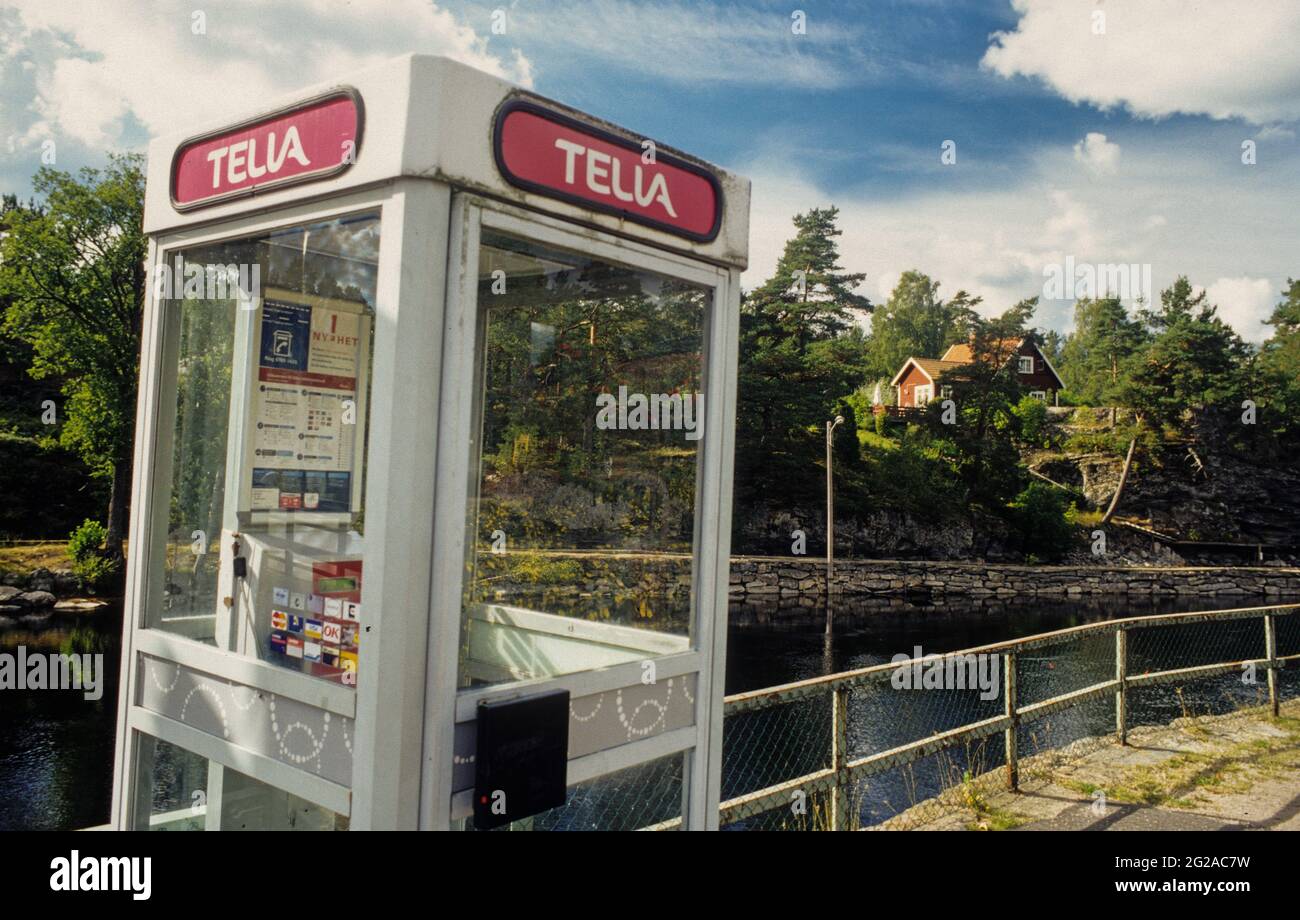 Last of its kind: a Telia telephone booth on the bank of a canal in ...
