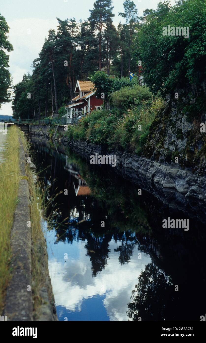 Clear skies, clear waters: canal connecting two lakes in Swedish ...