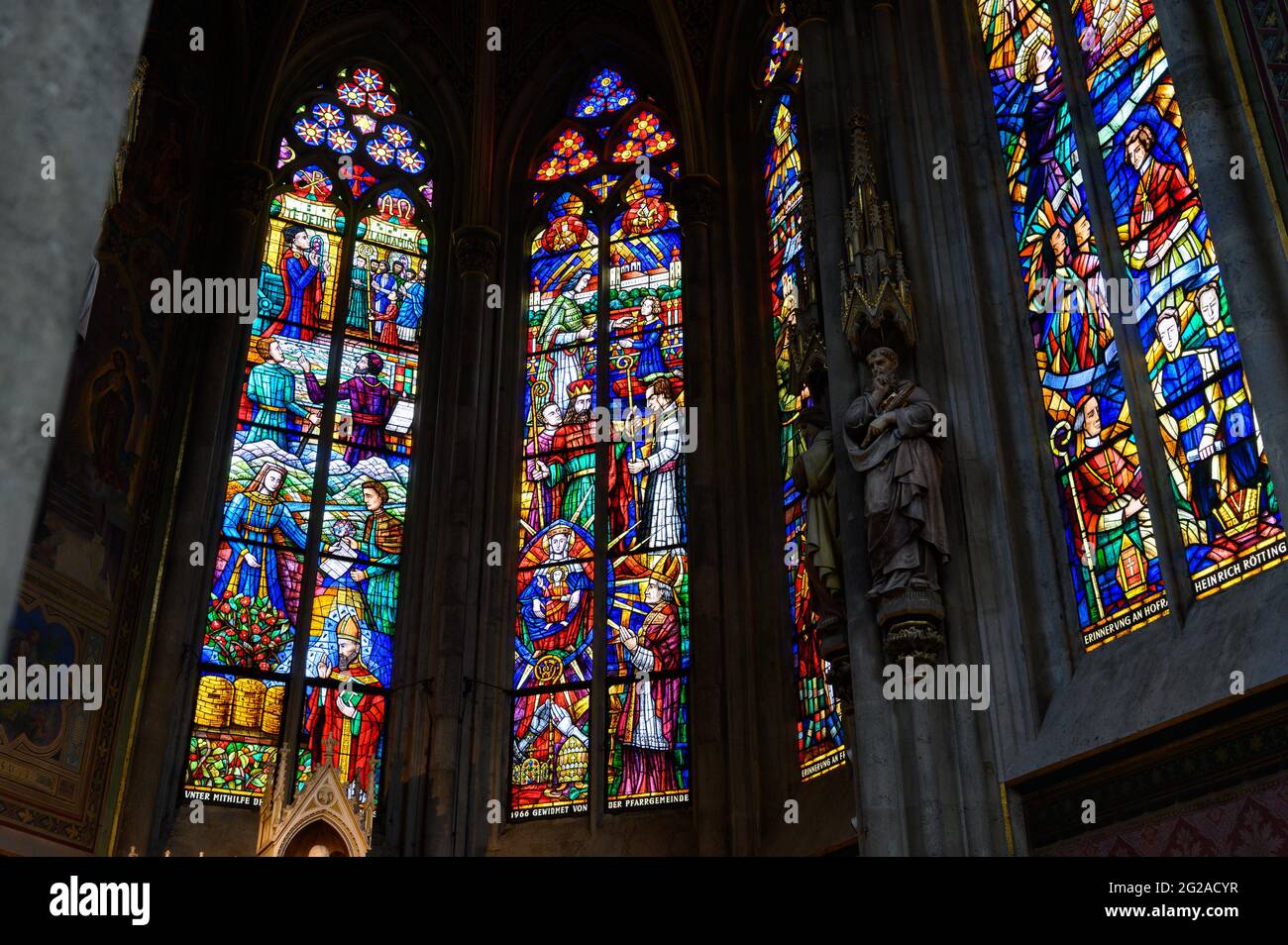 Stained-glass window depicting various figures and events in the ...