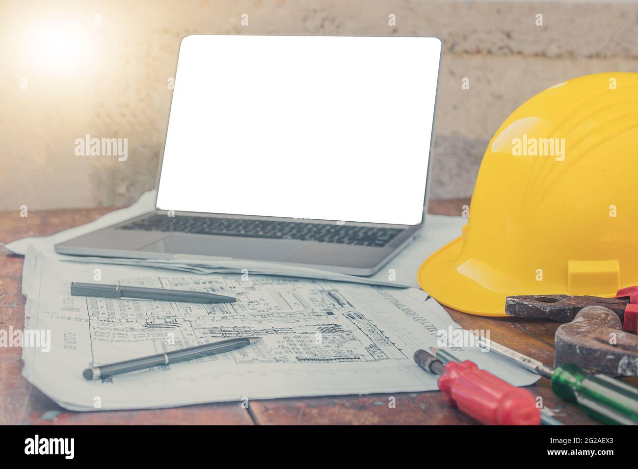 Blueprint computer laptop tool equipment on desk for engineering design ...