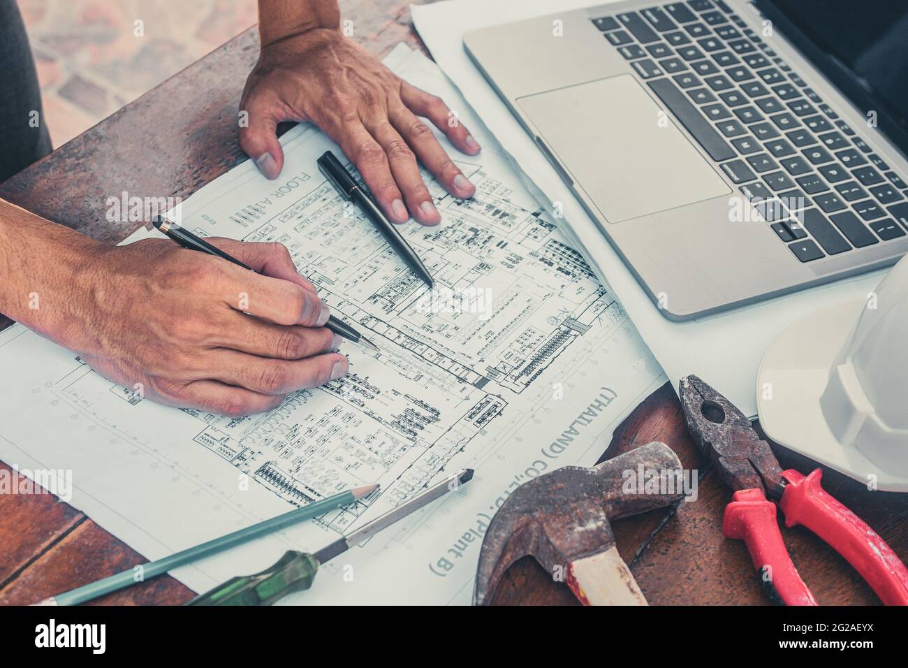 Close up hand write on paperwork blueprint check design building Stock ...