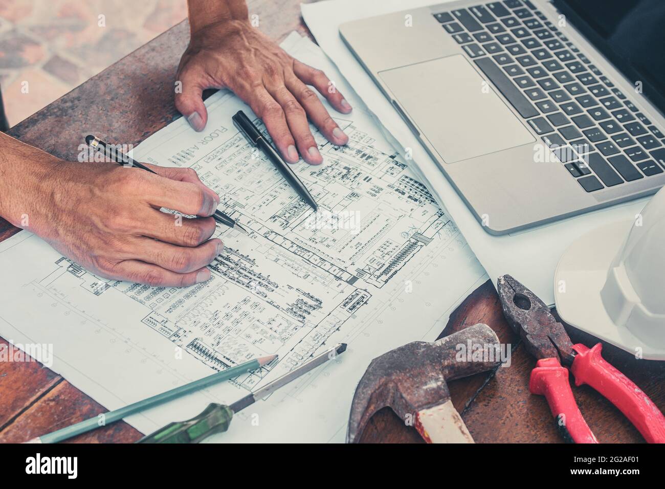 Close up hand check on paper blueprint drawing design real estate ...