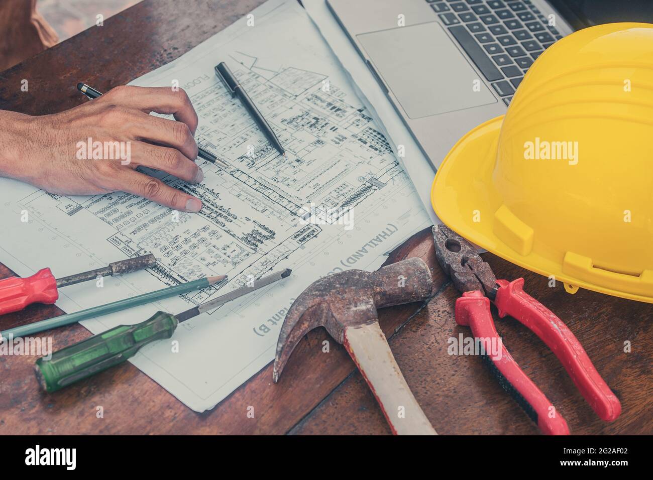 Close up hand check on paper blueprint drawing design real estate ...