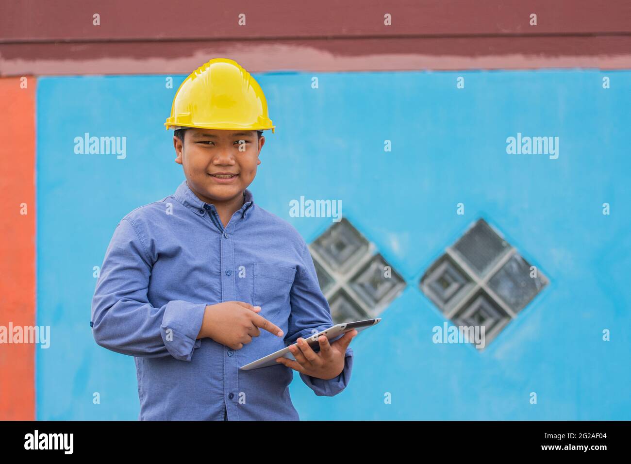 Worker Engineer smile happy in work using tablet technology Stock Photo ...