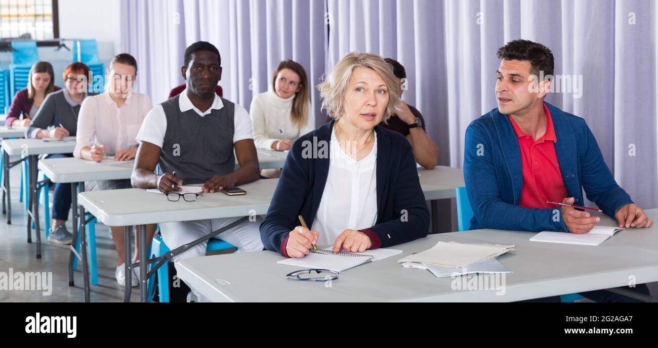 Adult students on training session Stock Photo - Alamy