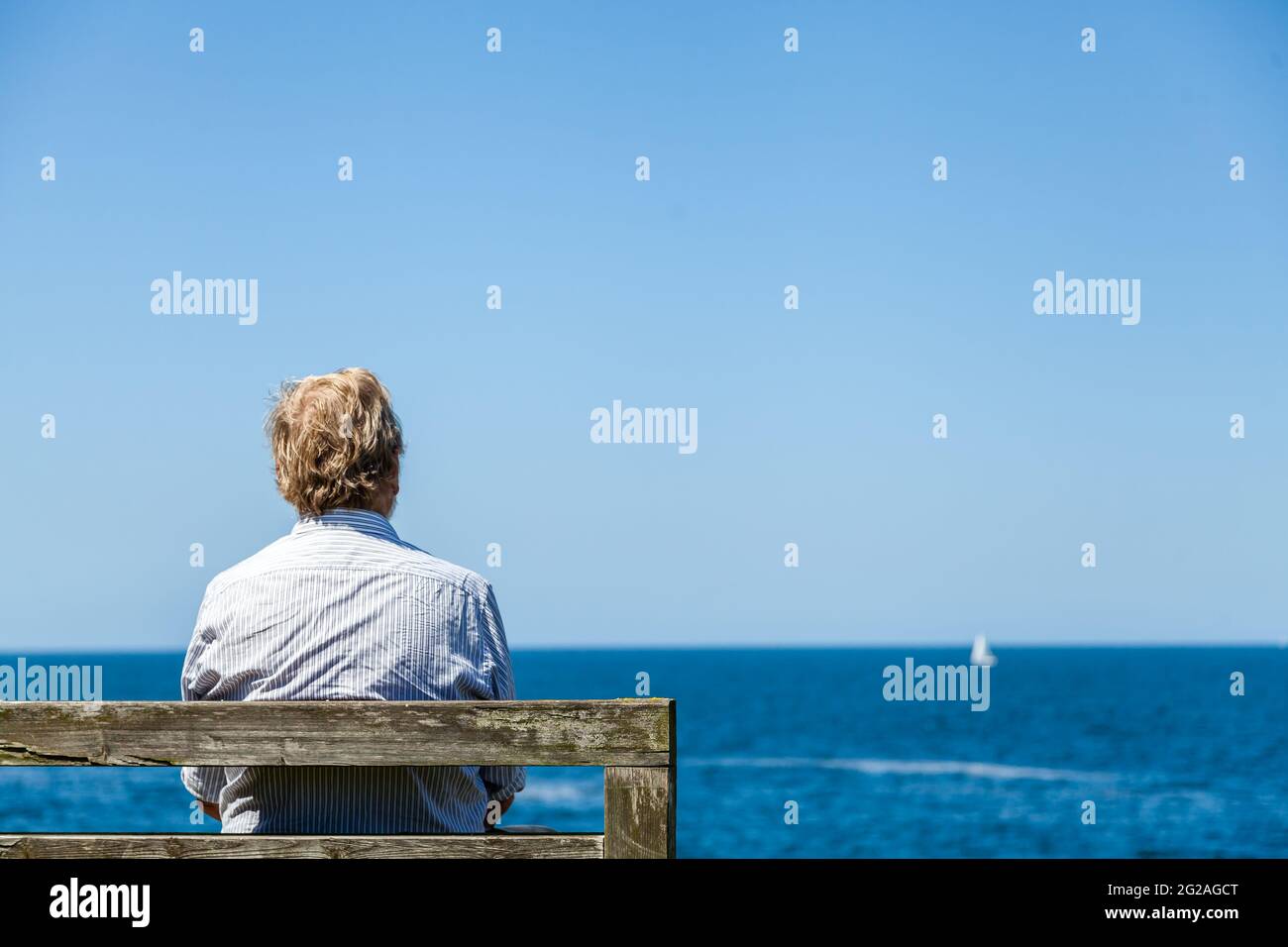 Man Sitting Facing Away