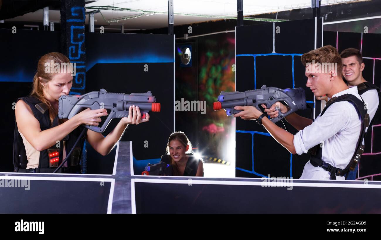 Two laser tag teams playing indoors Stock Photo - Alamy