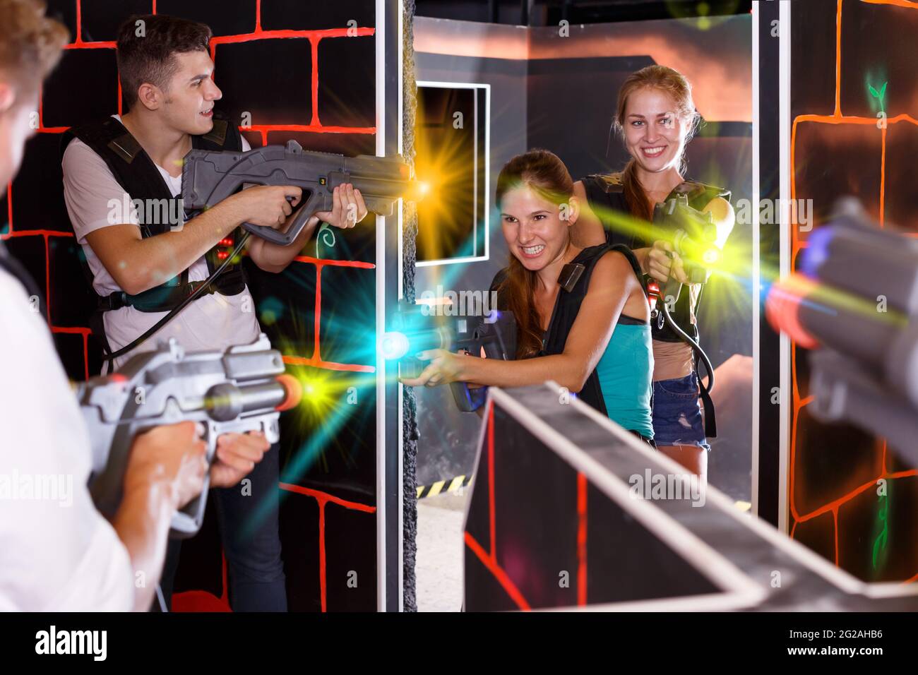 Laughing players playing in teams Stock Photo - Alamy