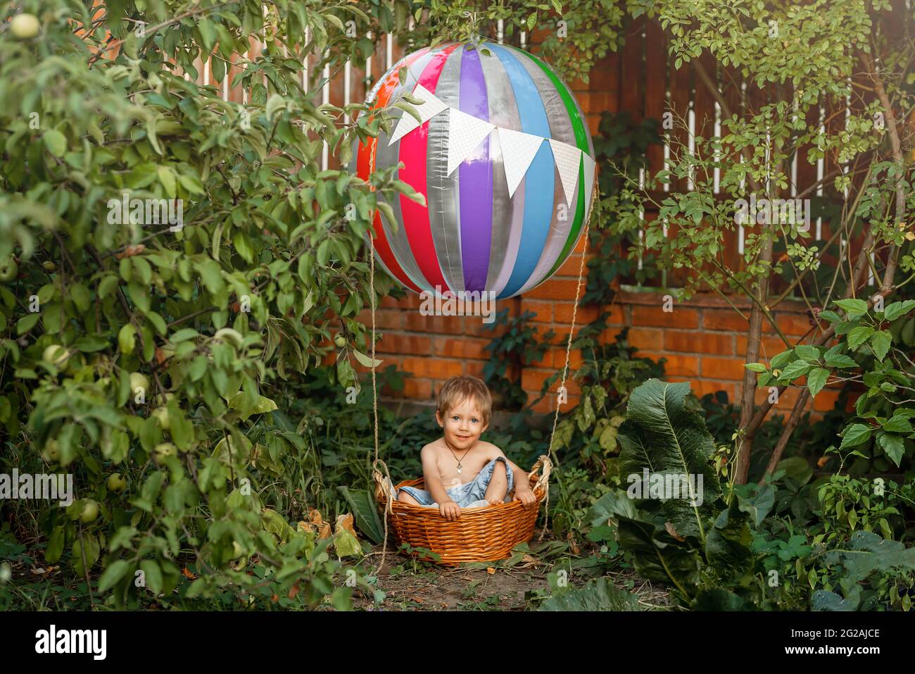 Freedom and happy childhood concept. The toy air balloon for child ...