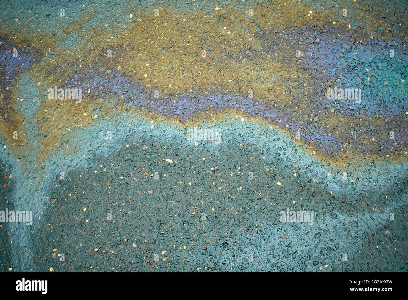 Oil stain on Asphalt, color Gasoline fuel spots on Asphalt Road as ...