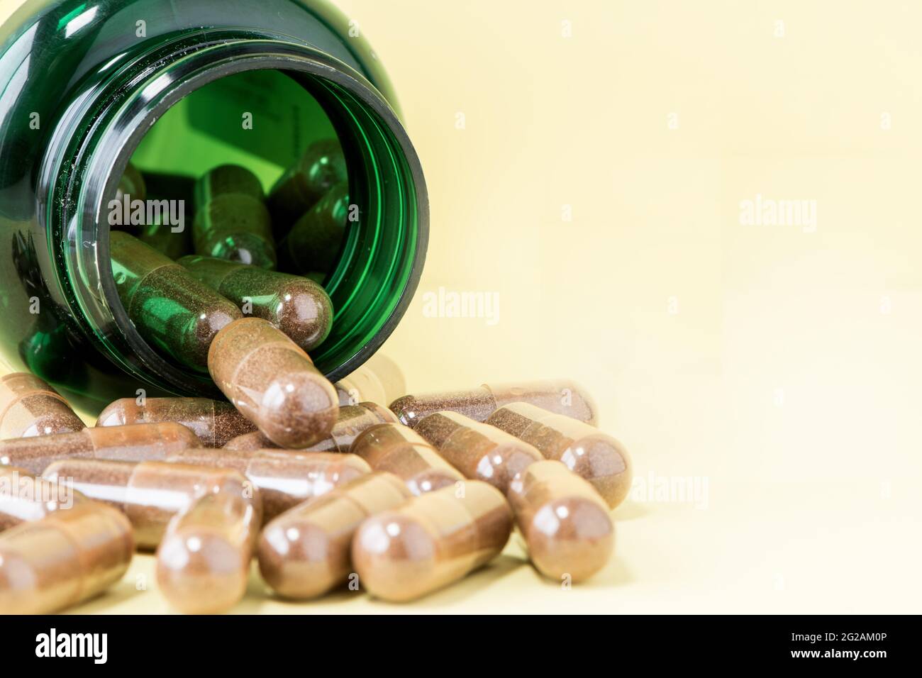 Medical pills and tablets spilling out of a drug bottle Stock Photo - Alamy