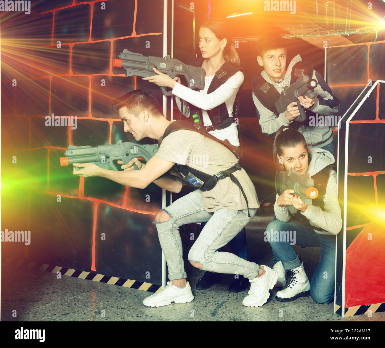 Young people having fun on lasertag arena Stock Photo - Alamy