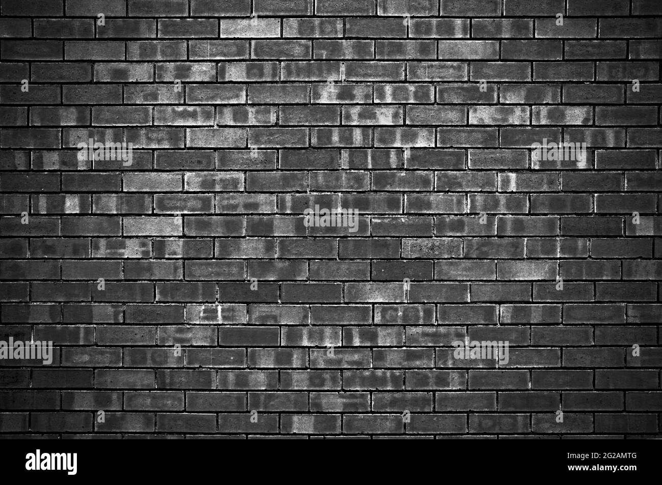 Dark brick wall background Stock Photo - Alamy