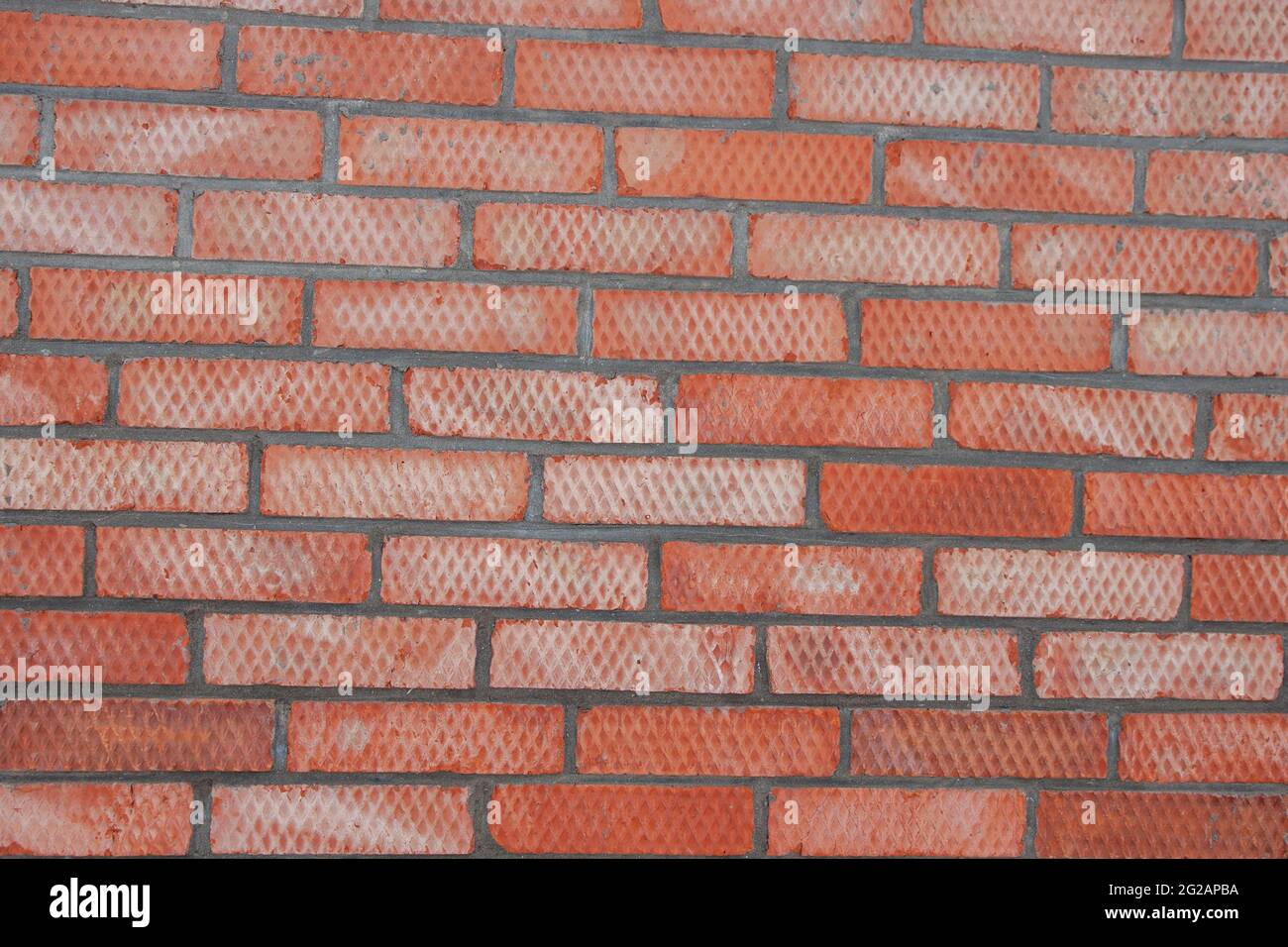 The red brick wall is made of corrugated brick. Perspective view ...