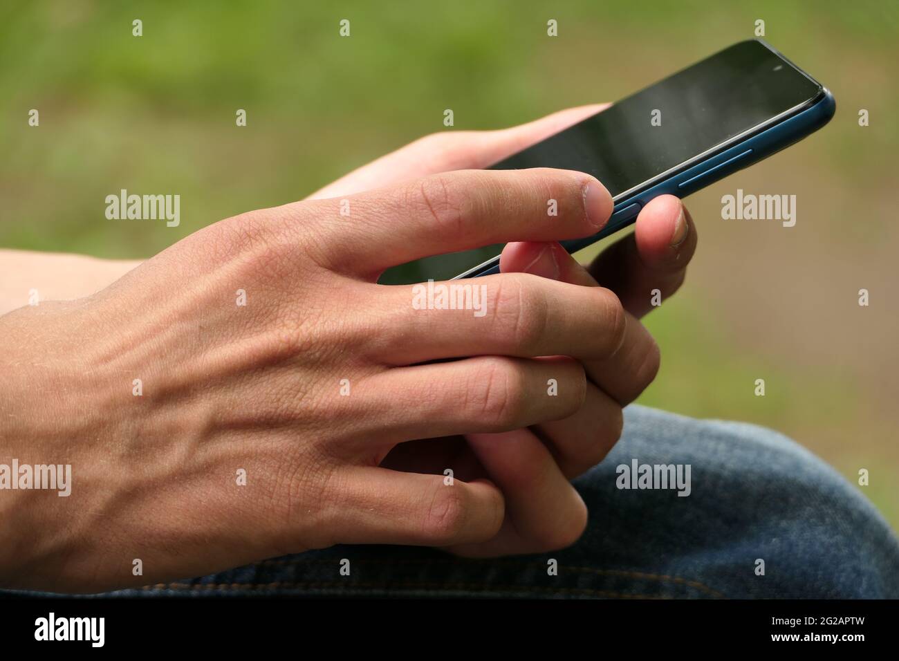 Cell phone, smartphone in the hands of a man Stock Photo - Alamy