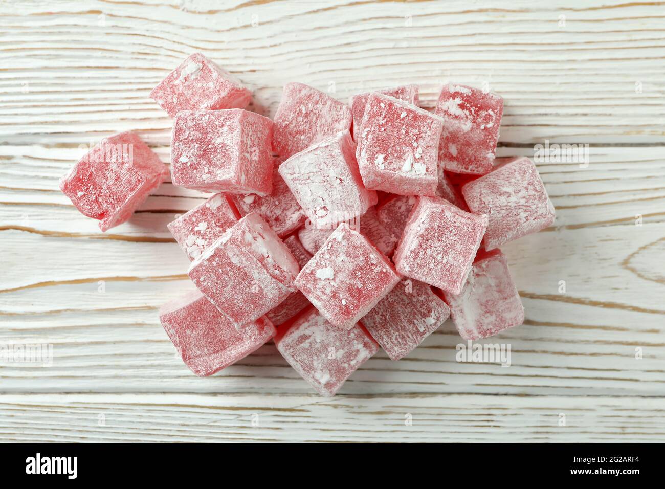 Delicious turkish delight cubes on wooden background Stock Photo - Alamy
