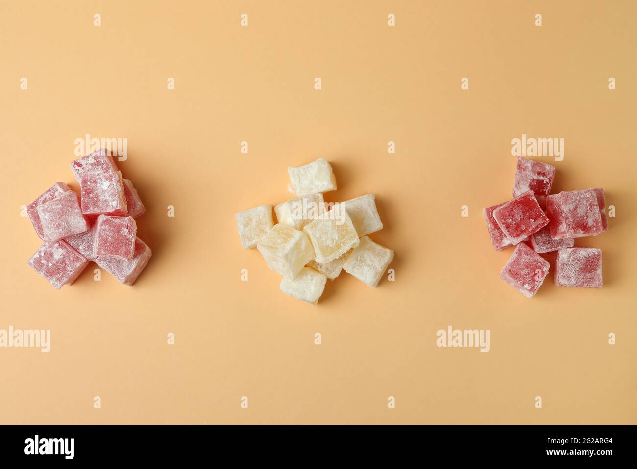 Delicious turkish delight cubes on beige background Stock Photo - Alamy