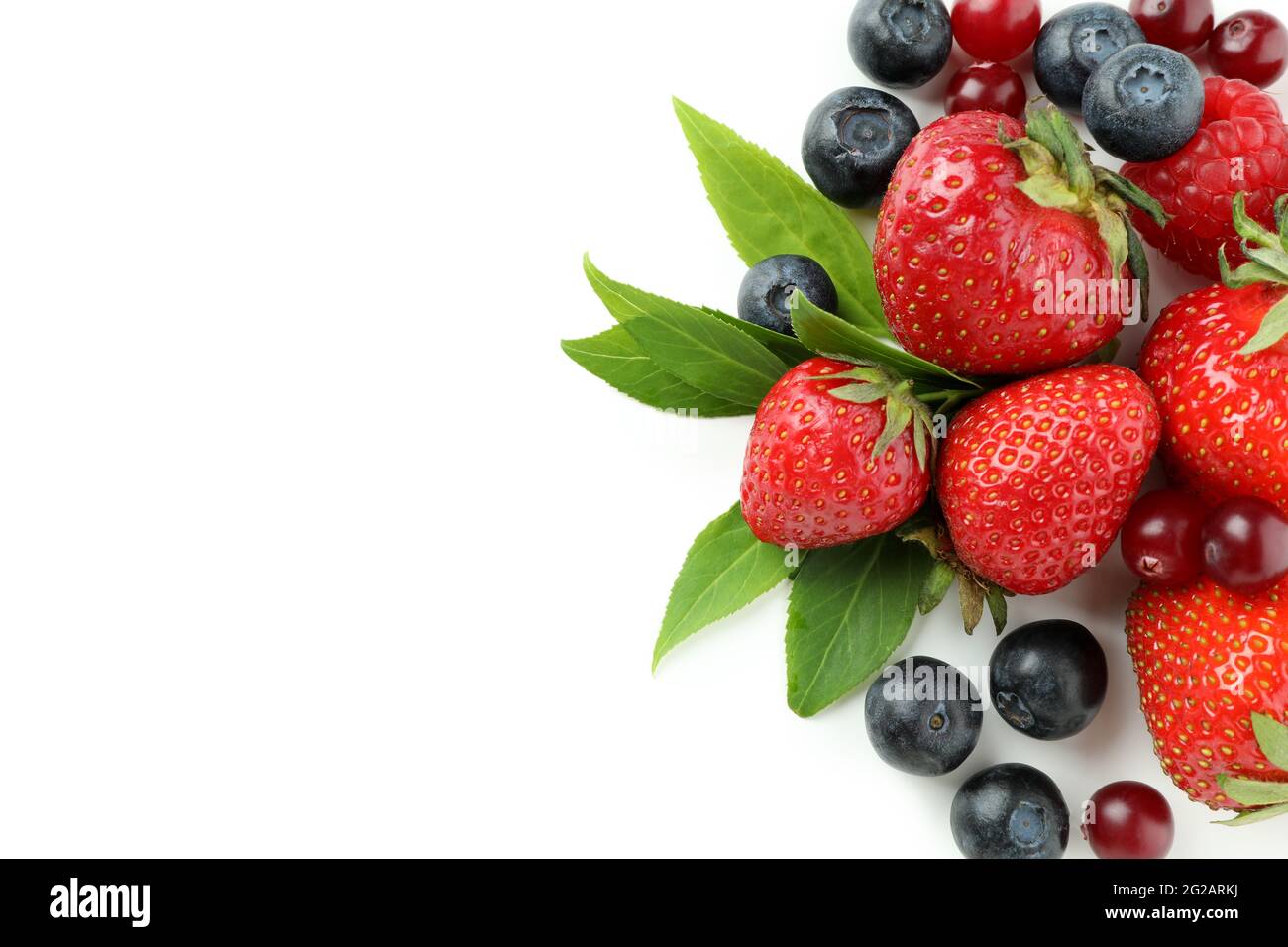 Delicious berry mix isolated on white background Stock Photo - Alamy