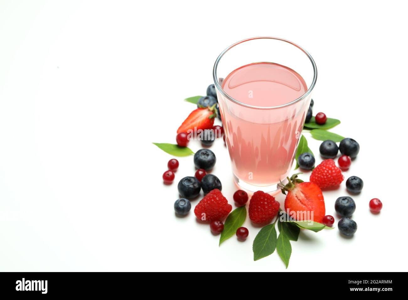 Delicious fresh berry mix and juice on white background Stock Photo - Alamy