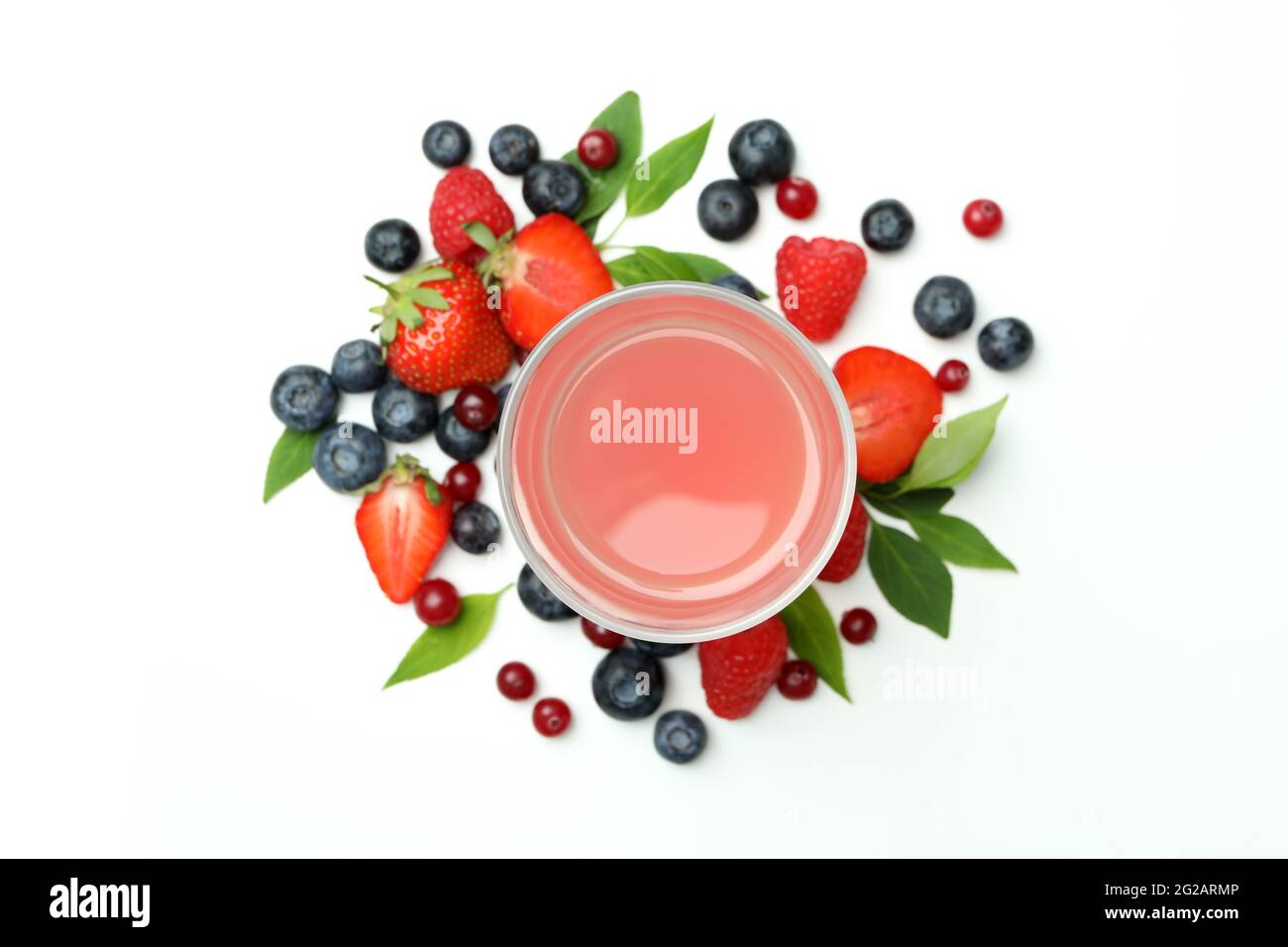 Delicious fresh berry mix and juice on white background Stock Photo - Alamy