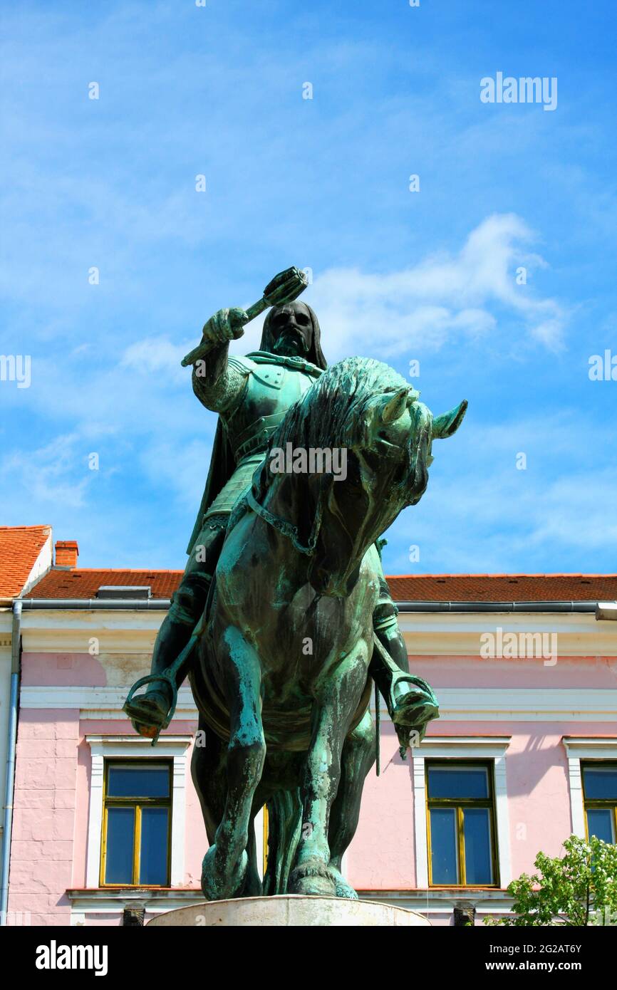 A statue of Janos Hunyadi on Szechenyi Square in Pecs, Hungary Stock ...