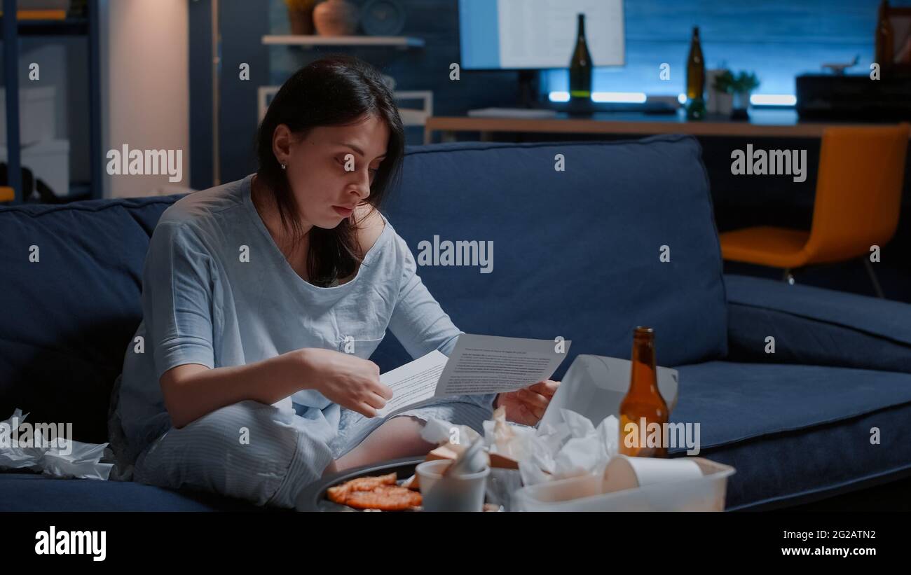 Furious, desperate hysterical woman ripping paper letter with banking ...