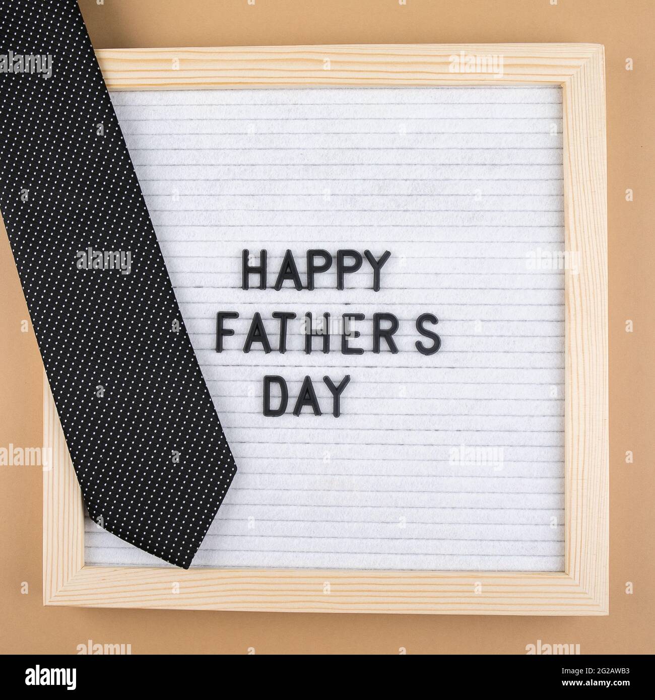 Letter board with congratulations lettering Happy Father's Day and ...