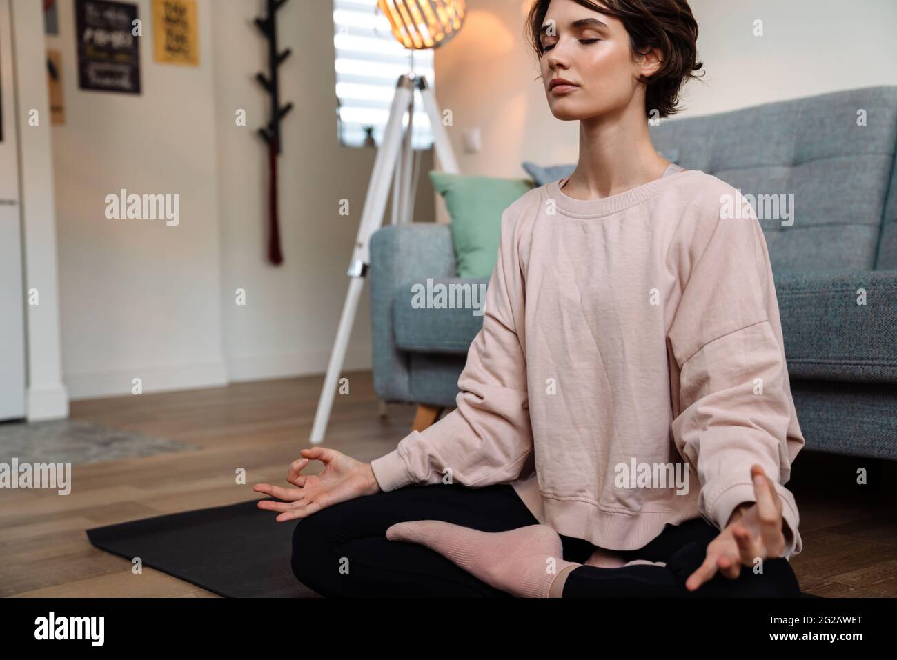 Beautiful girl meditating hi-res stock photography and images - Alamy