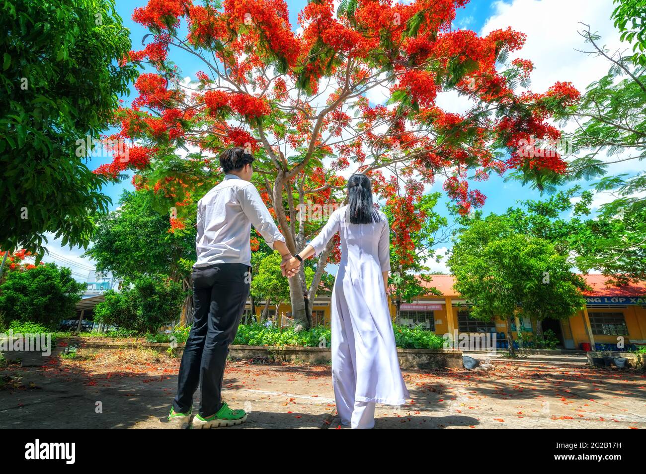 Flowers In Girls Hands High Resolution Stock Photography and Images - Alamy