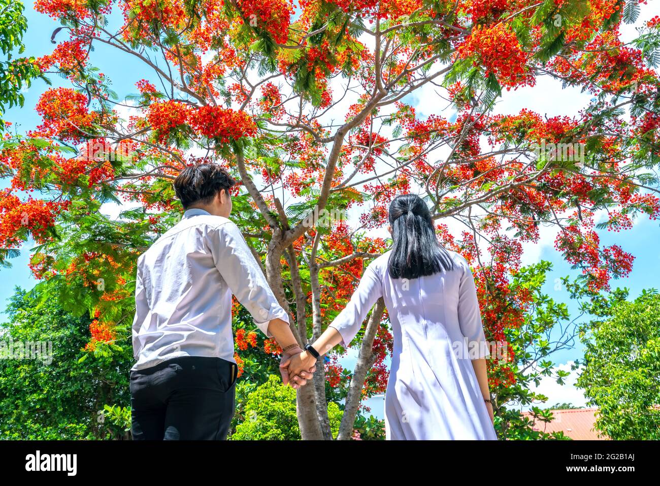 Flowers In Girls Hands High Resolution Stock Photography and Images - Alamy