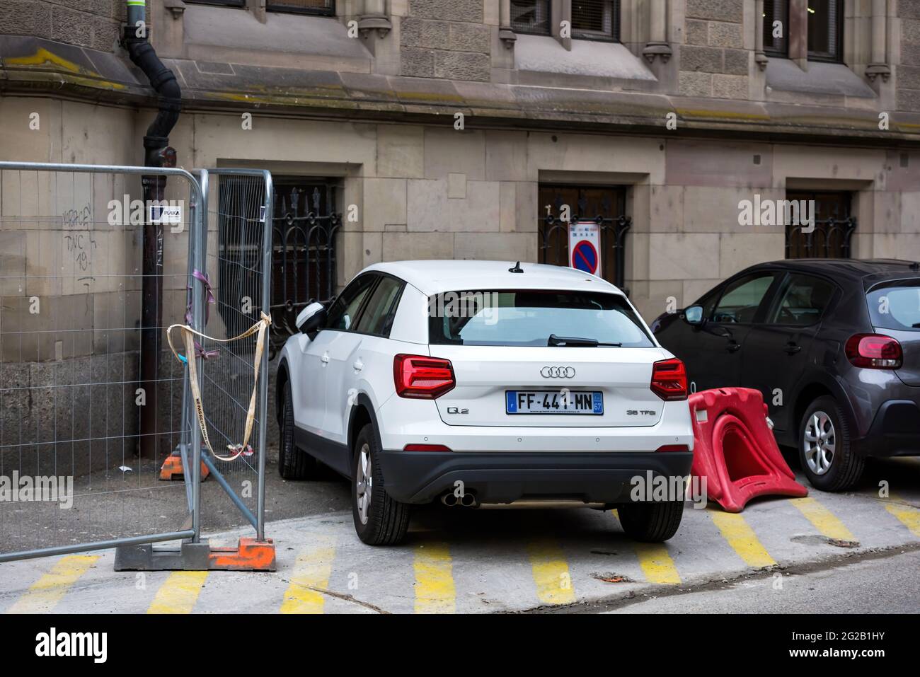 Rear view of new Audi Q2 mini SUV parked near construction site Stock ...