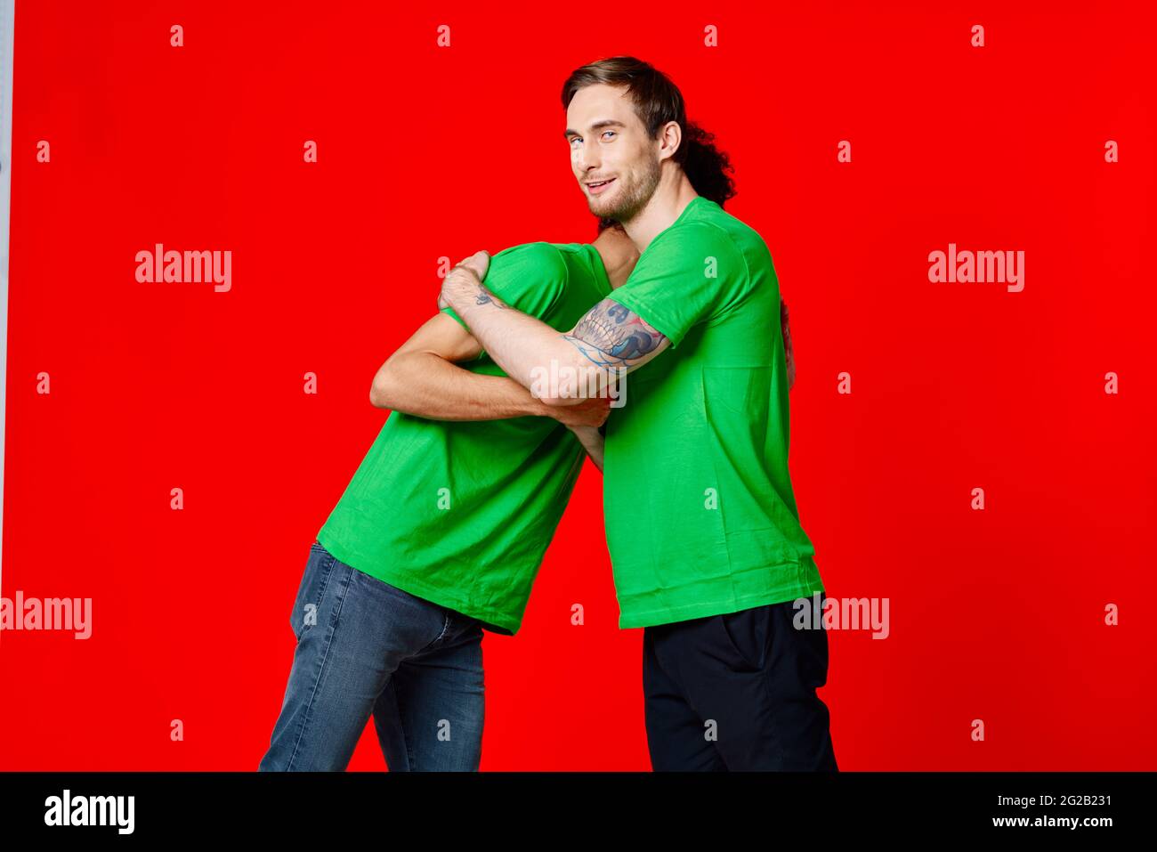 two friends greetings communication emotions red background Stock Photo ...