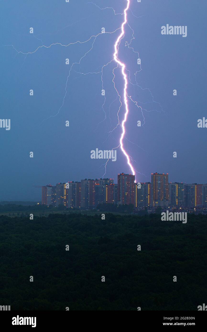 lightning strikes the city. Lightning strike at home Stock Photo - Alamy