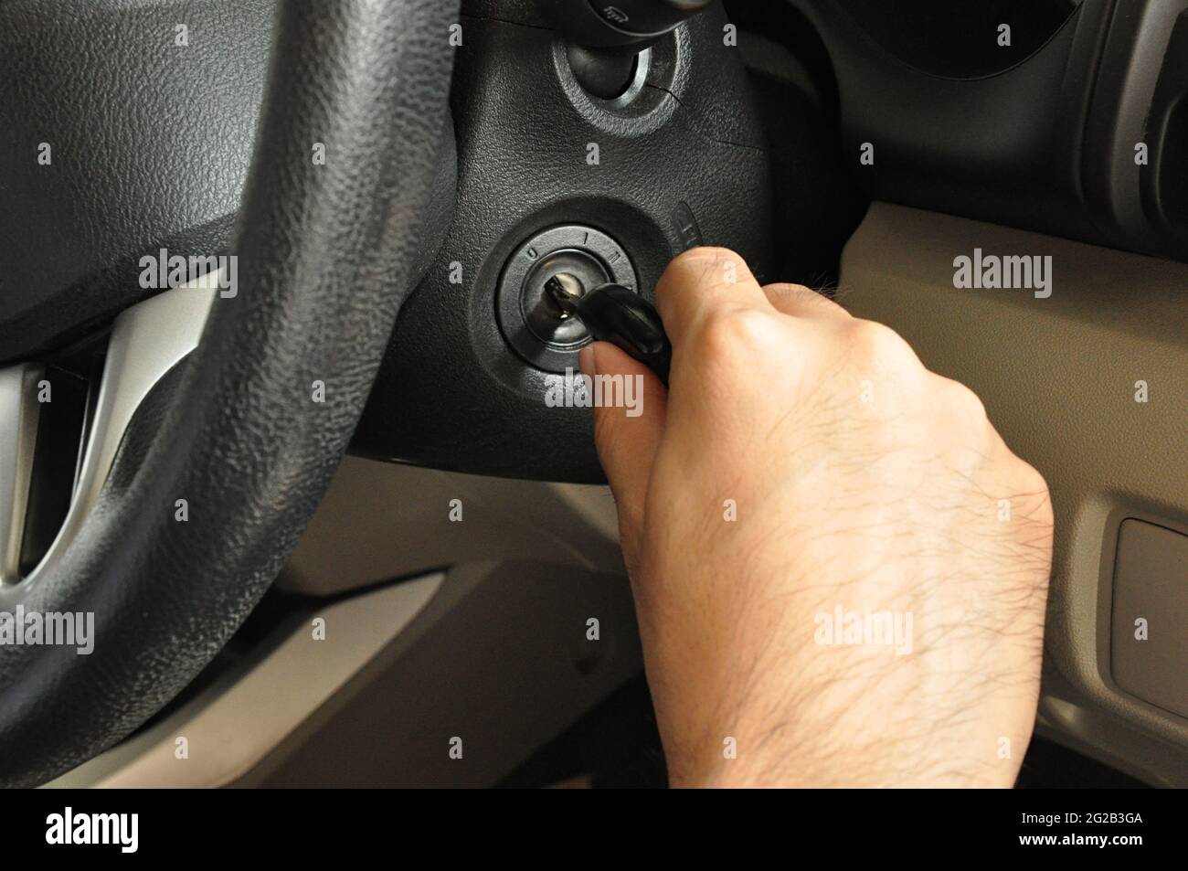 Man starting the car Stock Photo - Alamy