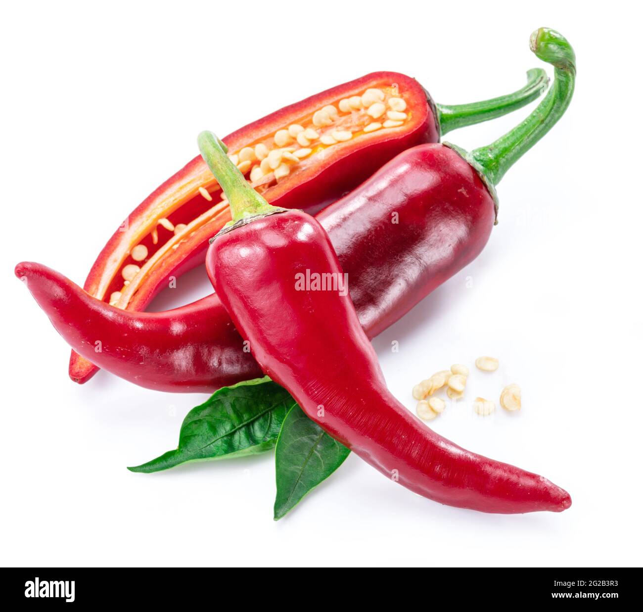 Fresh red chilli peppers and cross section of chilli pepper with seeds ...