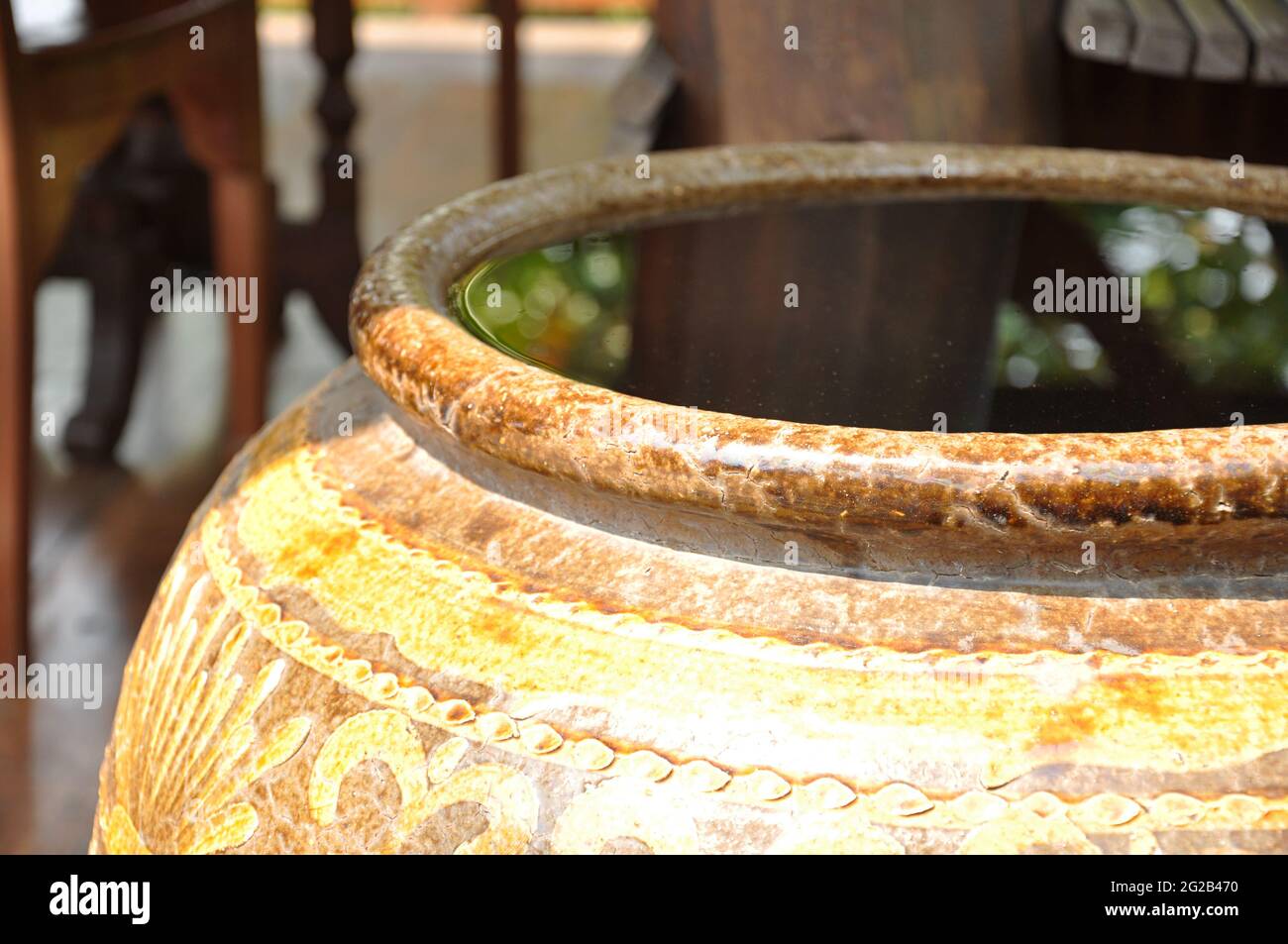 Old jar full of water Stock Photo - Alamy