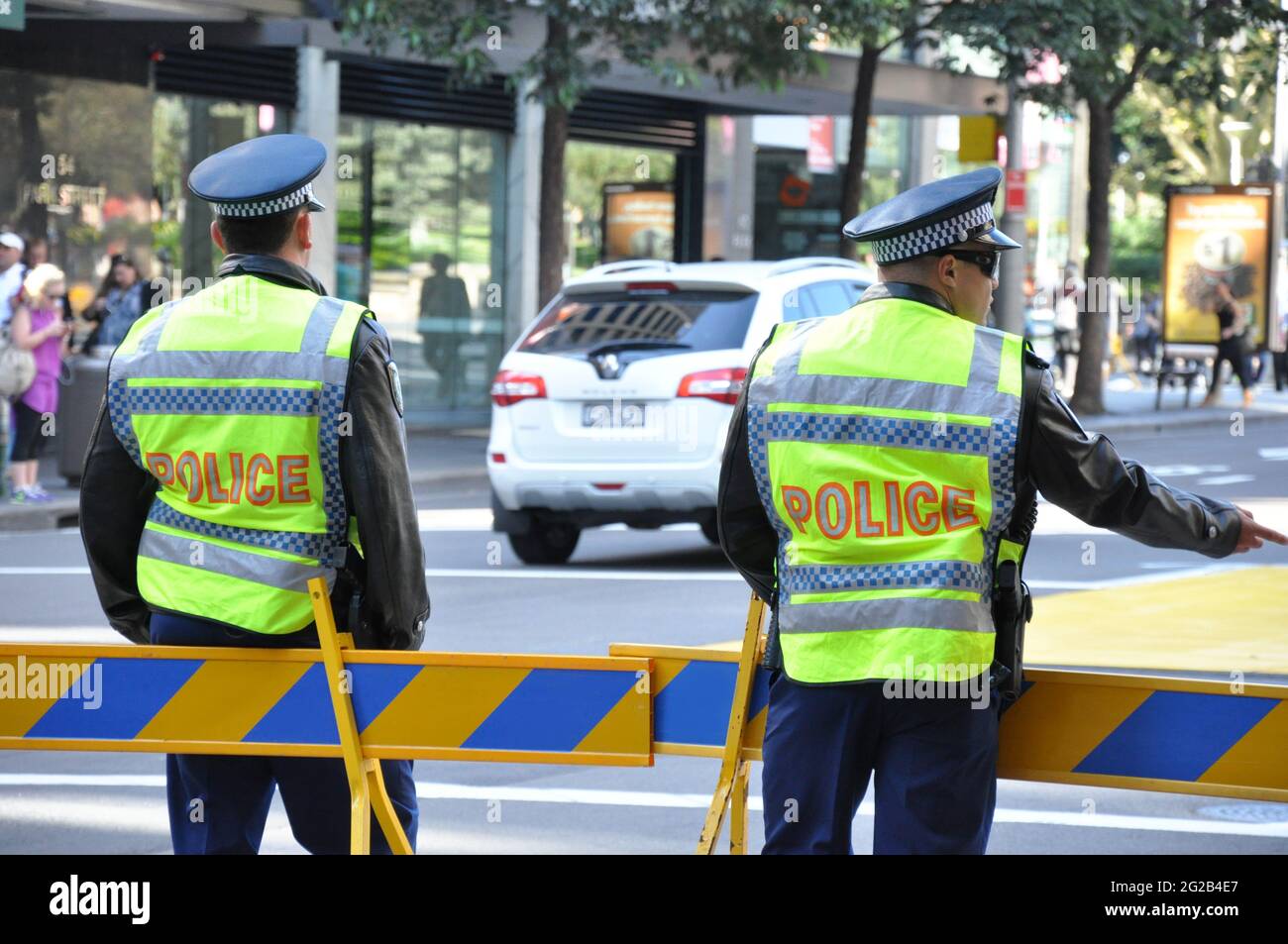 Two policemen at work Stock Photo - Alamy