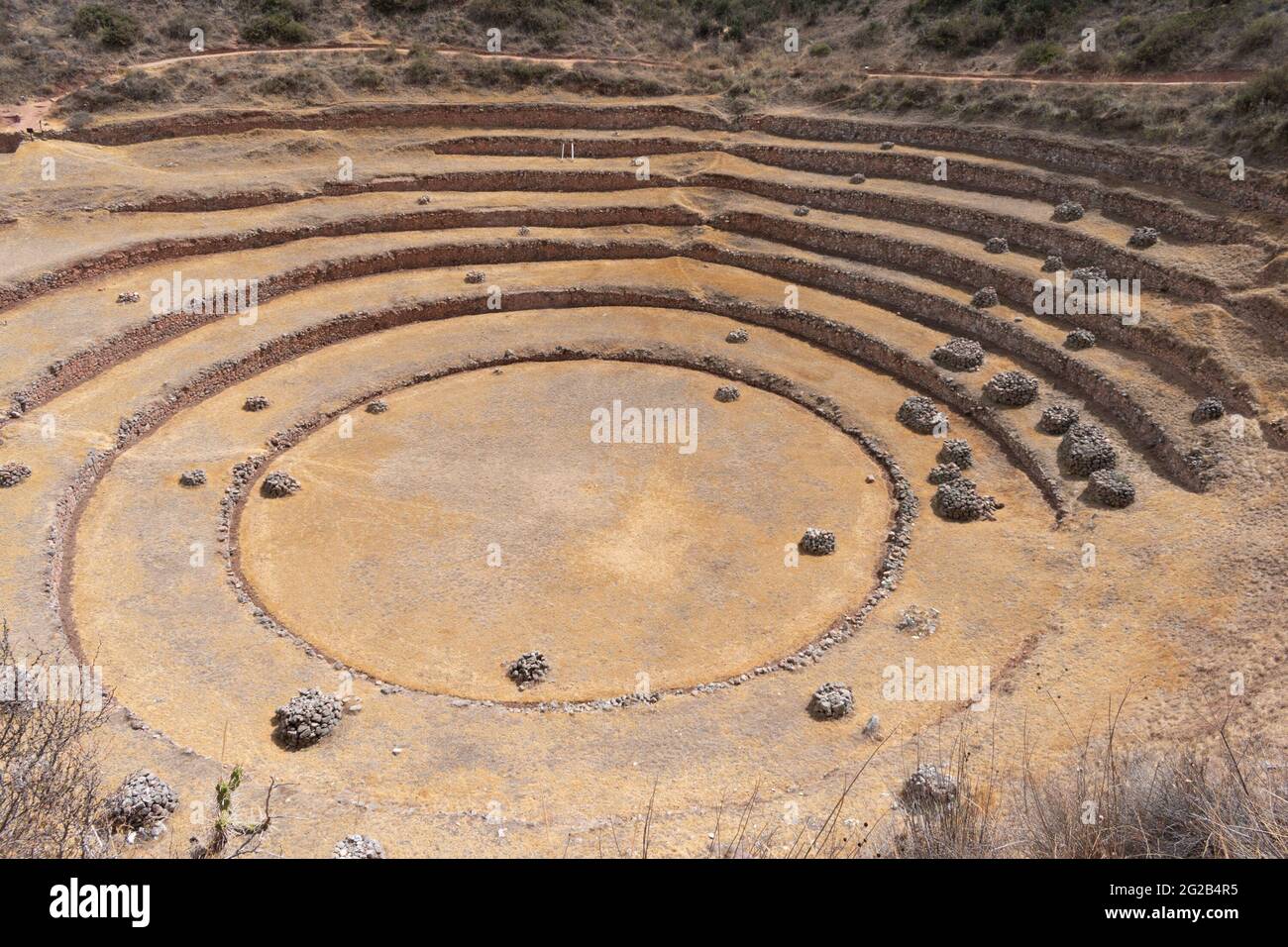 Restoration work underway at the circular Inca terraces at the ...