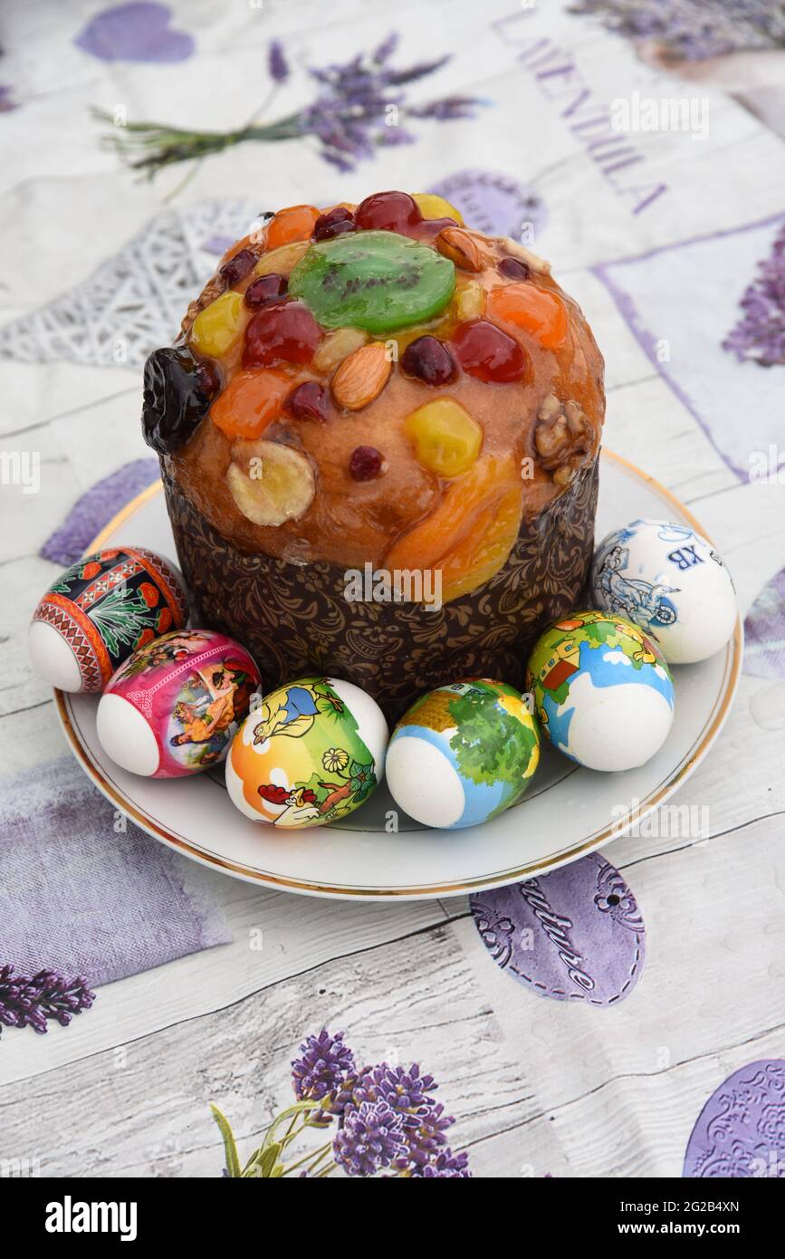 Pasca, Easter cake with painted eggs Stock Photo - Alamy