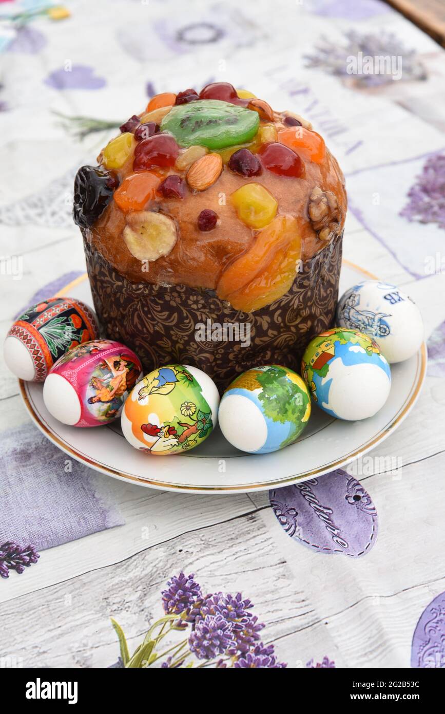 Pasca, Easter cake with painted eggs Stock Photo - Alamy