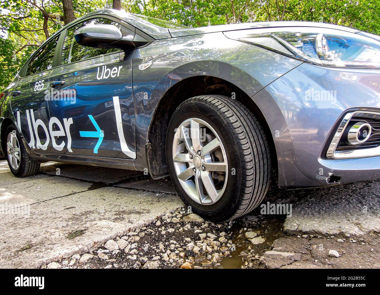 Uber car parked on the street hi-res stock photography and images - Alamy