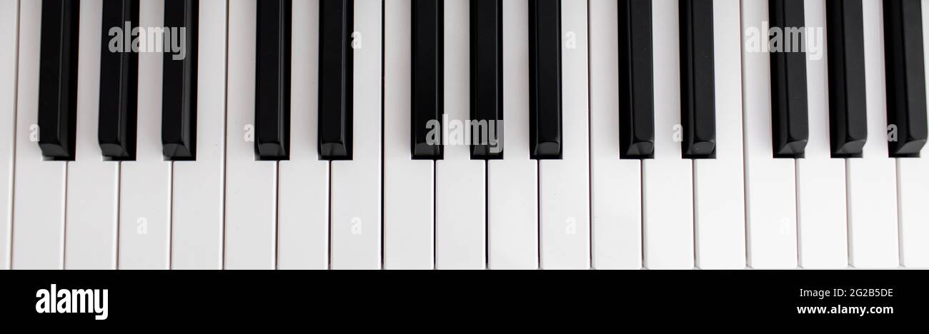 musical keyboard isolated, top view. wide frame Stock Photo - Alamy