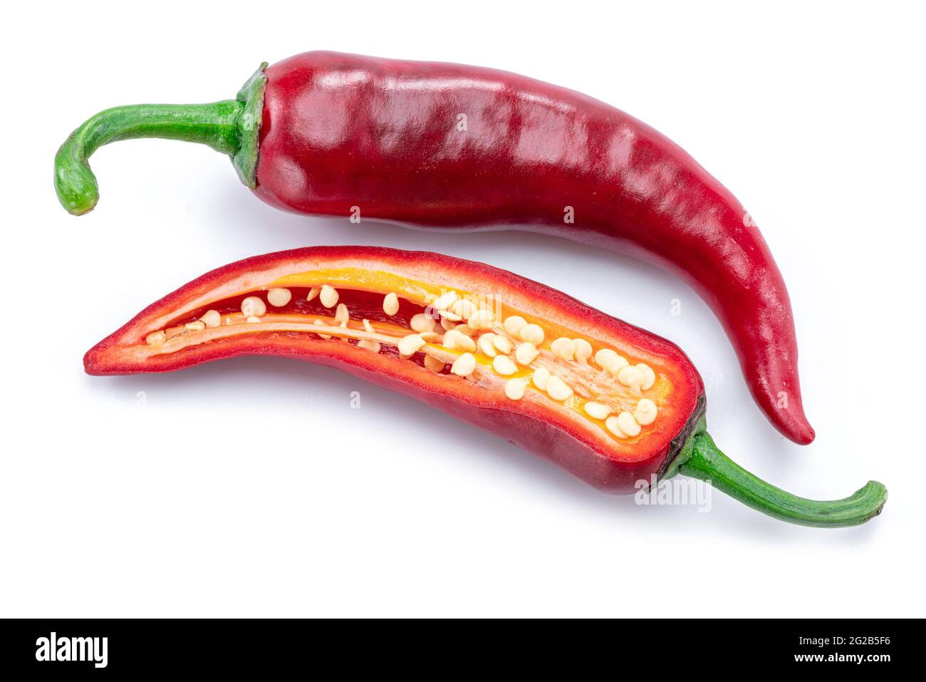 Fresh red chilli pepper and cross section of chilli pepper with seeds ...